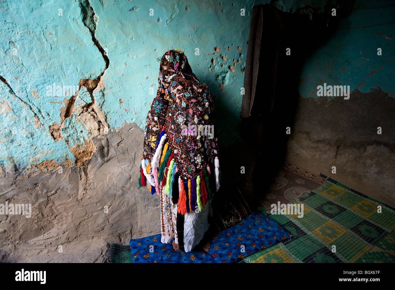 Woman standing in Siwan house Stock Photo - Alamy