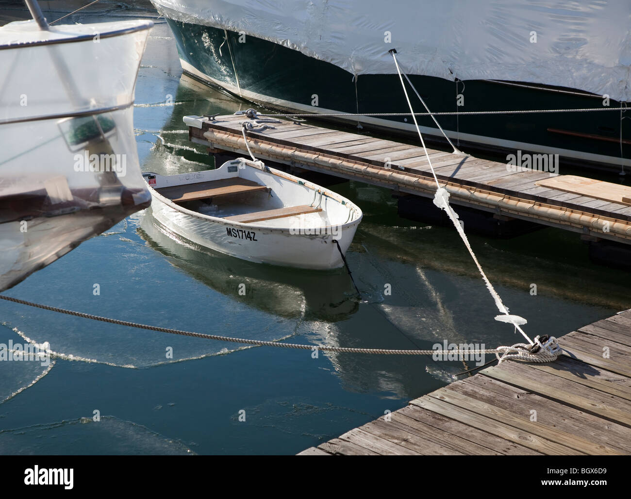 Dinghy in icy water Stock Photo - Alamy