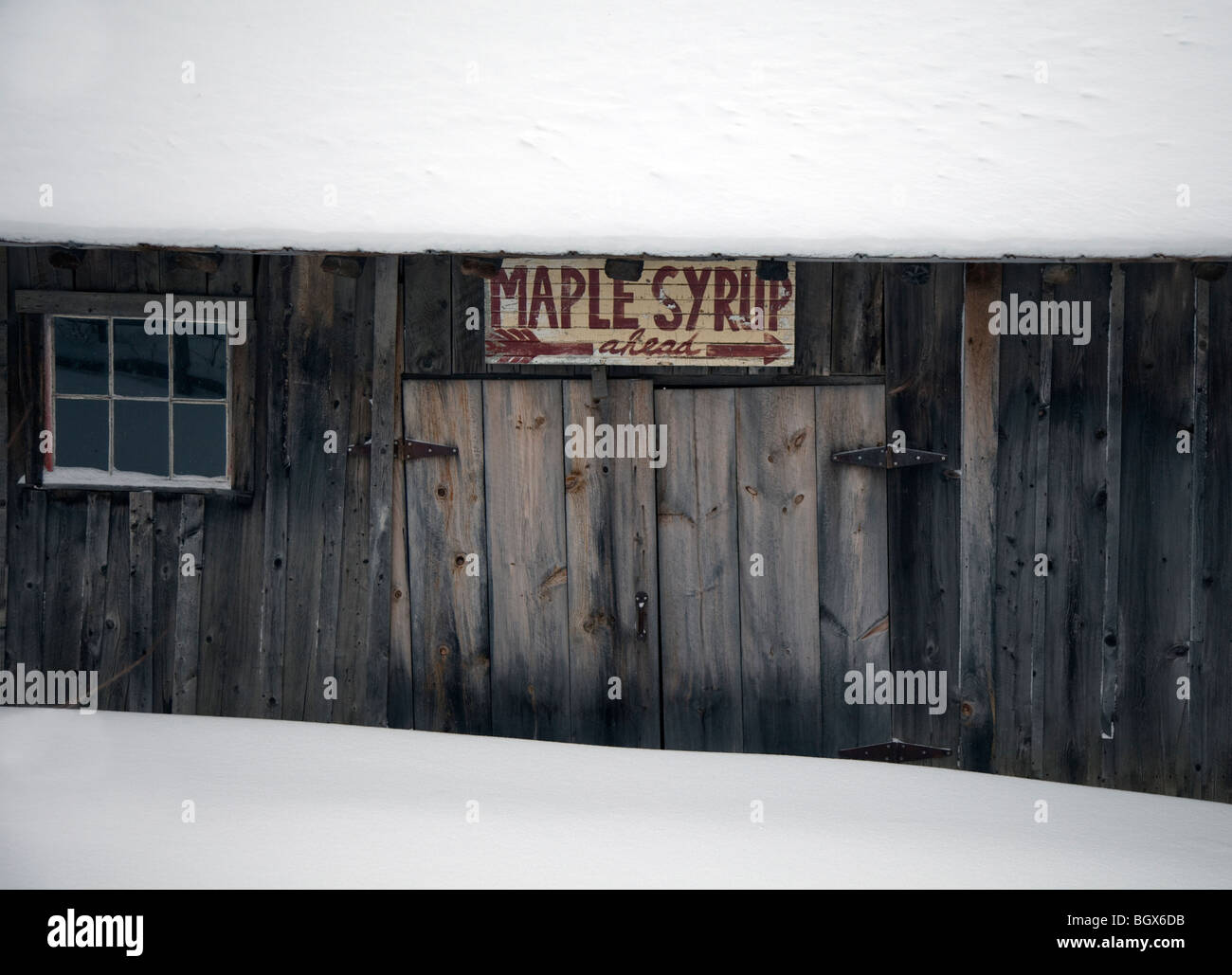 Maple syrup sign on the side of a building Stock Photo - Alamy