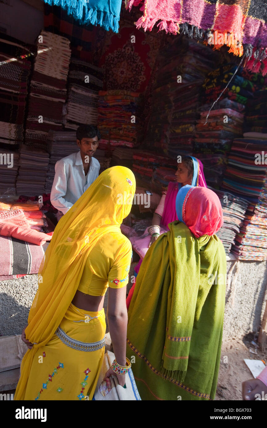 Textile vendor at the Camel Fair in Pushkar India Stock Photo - Alamy