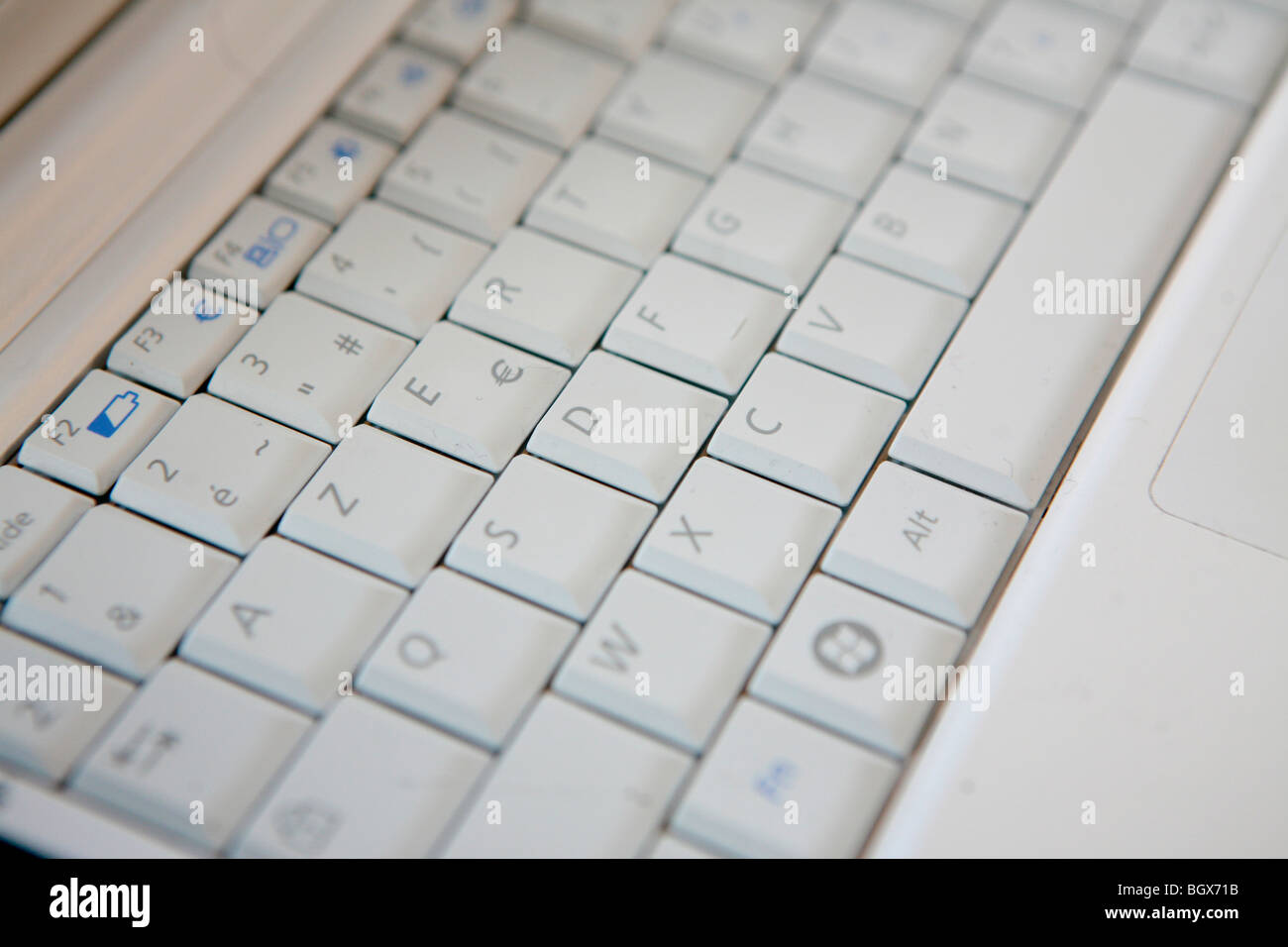 Very close shot of a white laptop keyboard showing letters Stock Photo ...