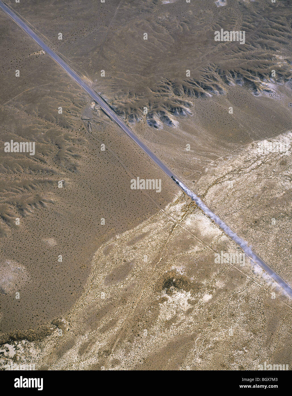 aerial view above truck crossing desert highway near Death Valley ...