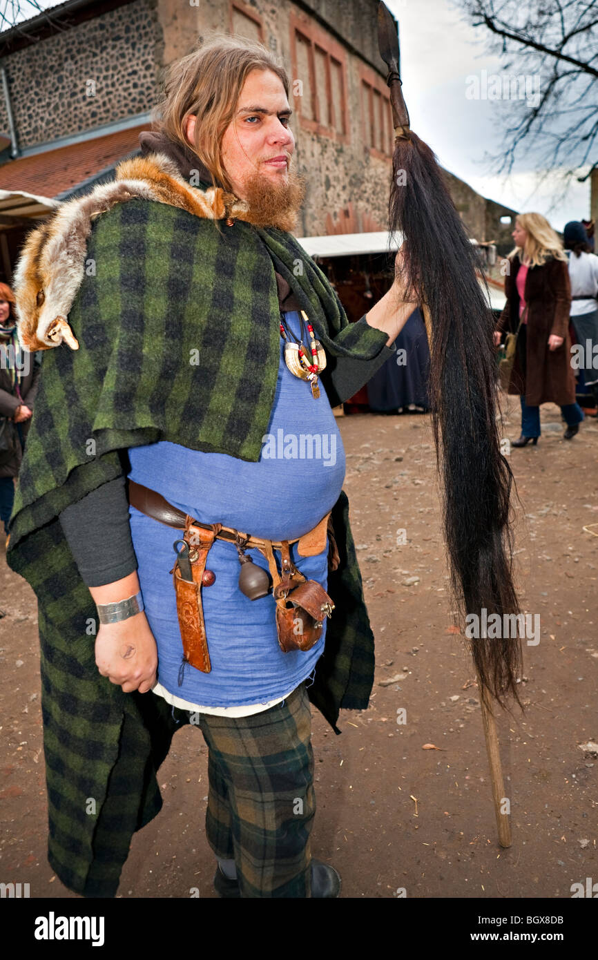 Man dressed in medieval clothing during the medieval markets on the ...