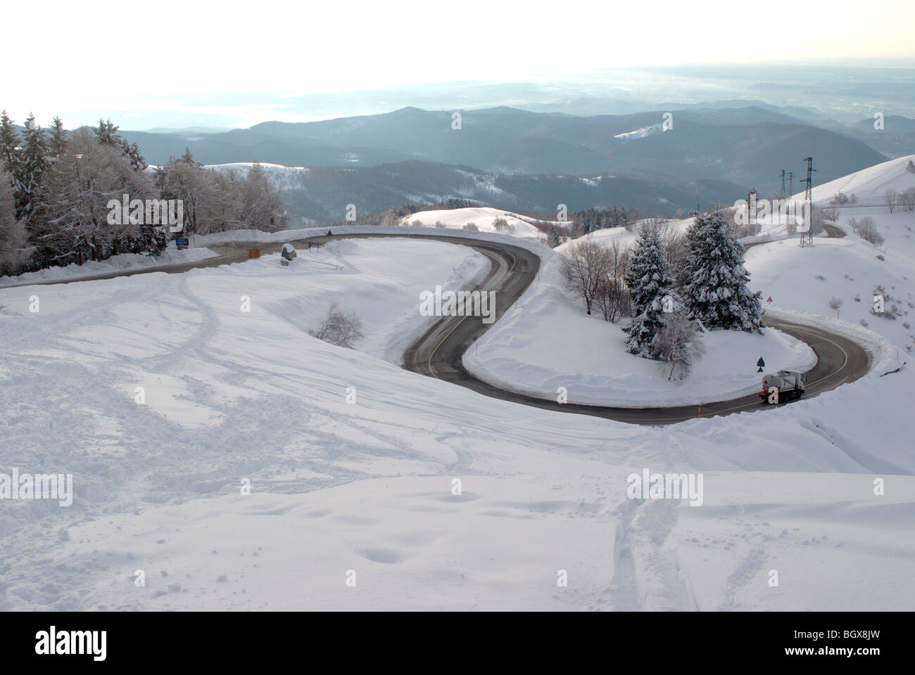 asphalt road in the snow, mottarone, Piedmont, Italy Stock Photo - Alamy