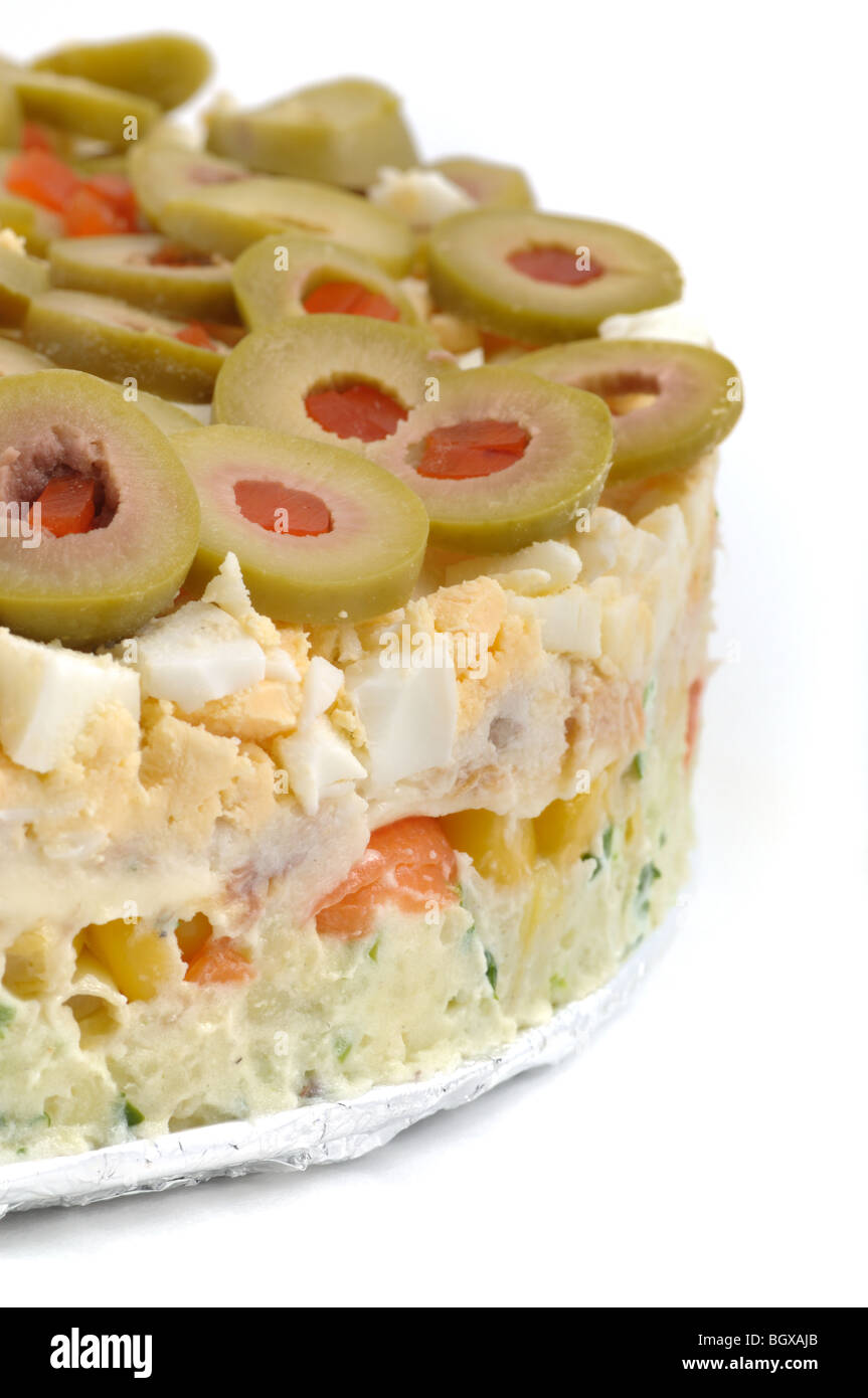 Cake made of layers of different vegetables and fish Stock Photo - Alamy
