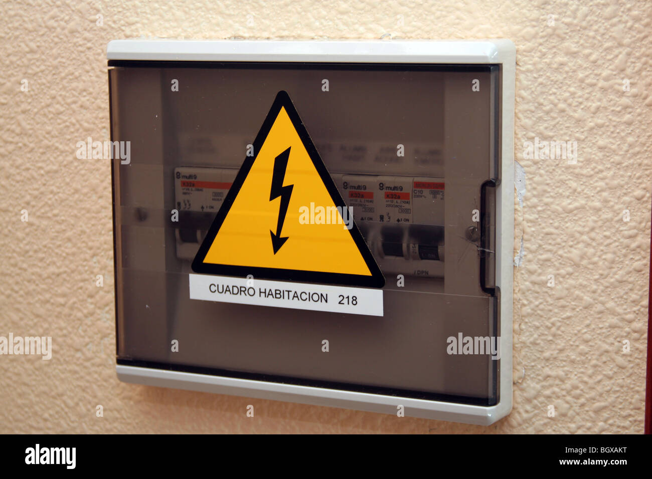 Warning on electrical mains circuit, Spain Stock Photo - Alamy