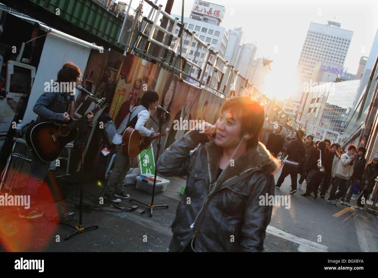 Musicians playing in the street in Shinjuku district, Tokyo, Japan, on ...
