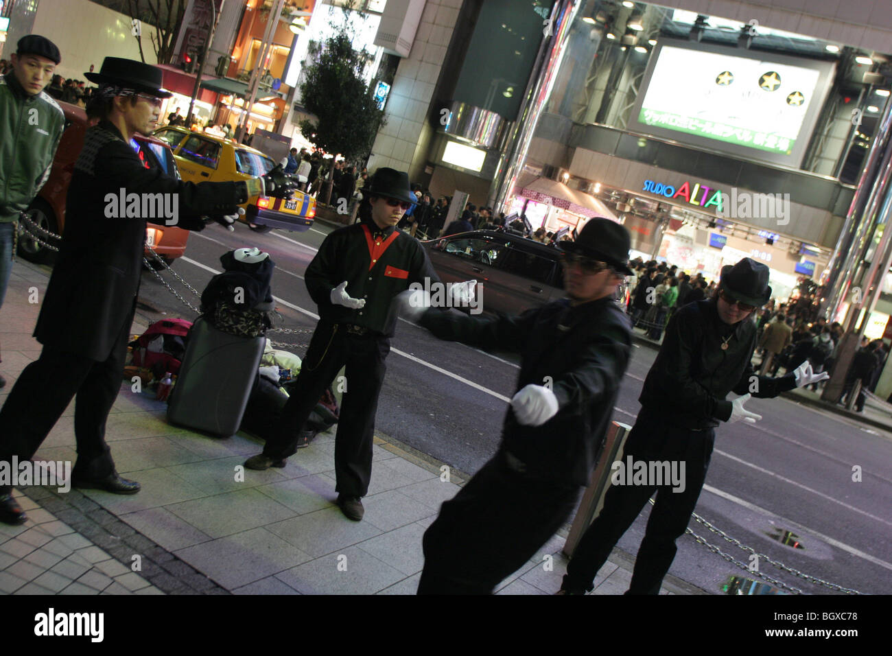 Musicians playing in the street in Shinjuku district, Tokyo, Japan, on ...