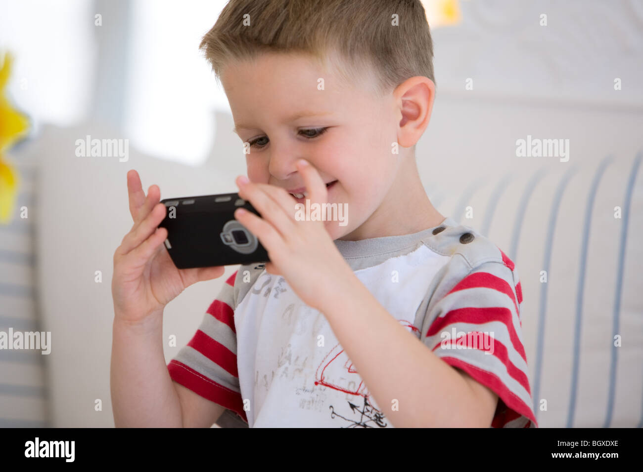 Boy with camera Stock Photo - Alamy