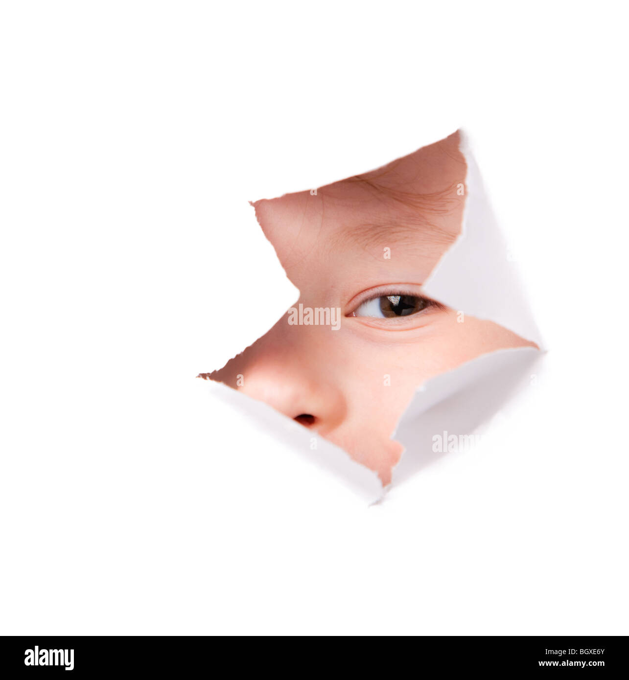 Looking through paper hole Stock Photo - Alamy