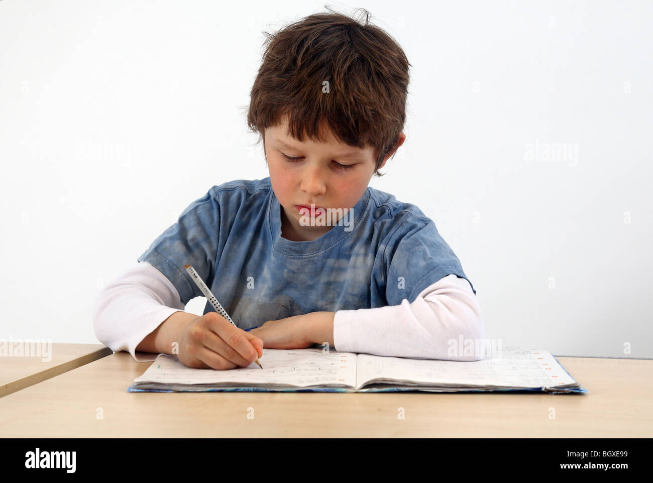 A boy doing homework, Berlin, Germany Stock Photo - Alamy