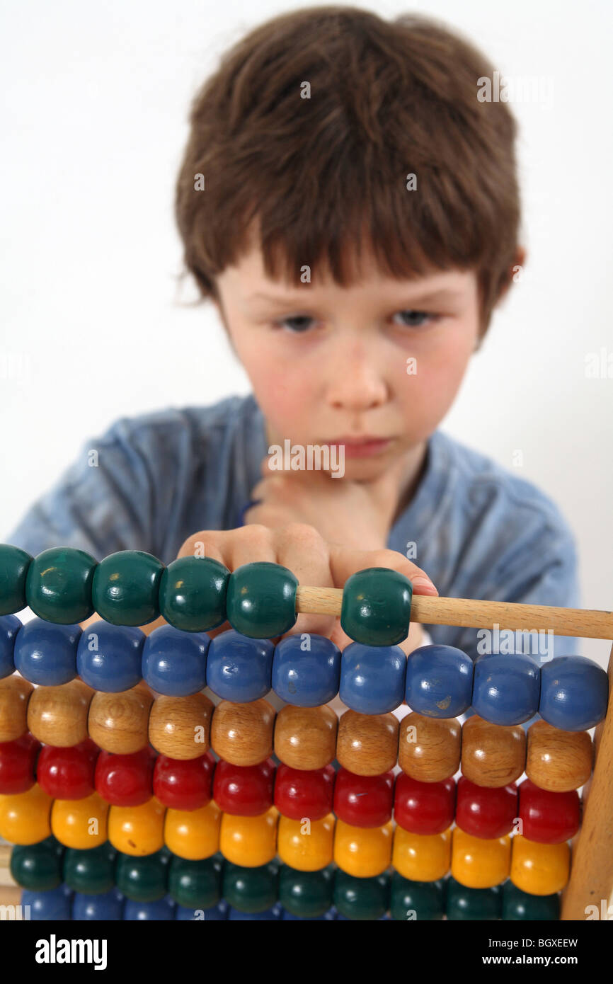 A boy counting on an abacus, Berlin, Germany Stock Photo - Alamy