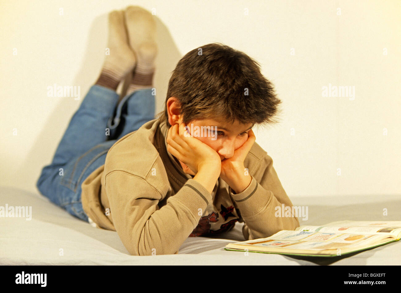 young boy studying for school Stock Photo - Alamy
