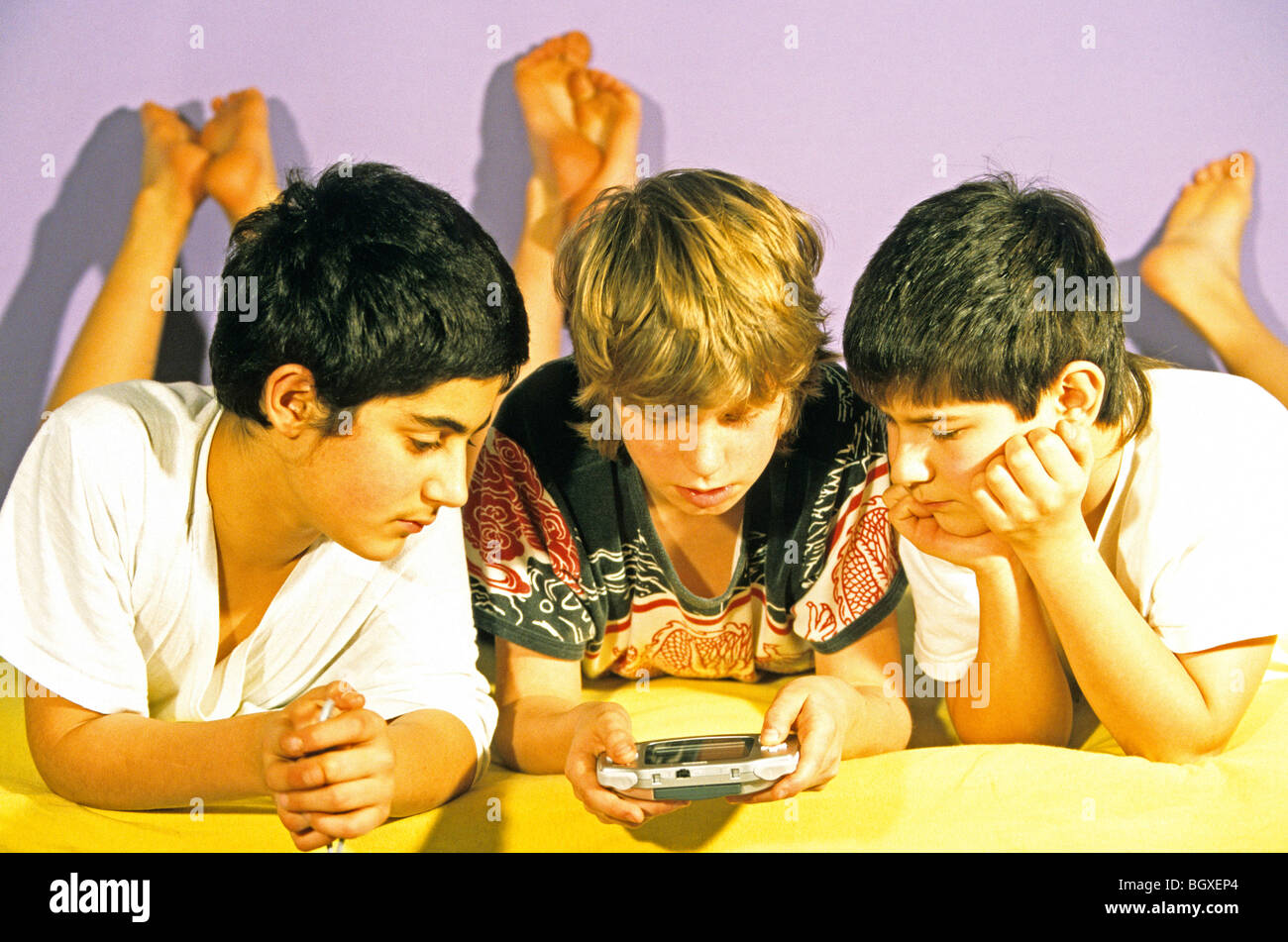 Three Young Boys Playing Computer High Resolution Stock Photography and ...