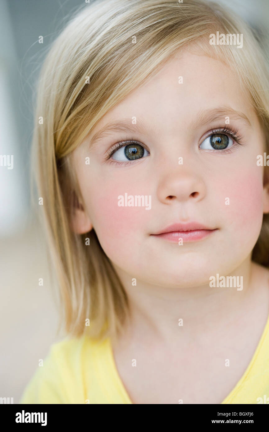 young girl looking interested Stock Photo - Alamy