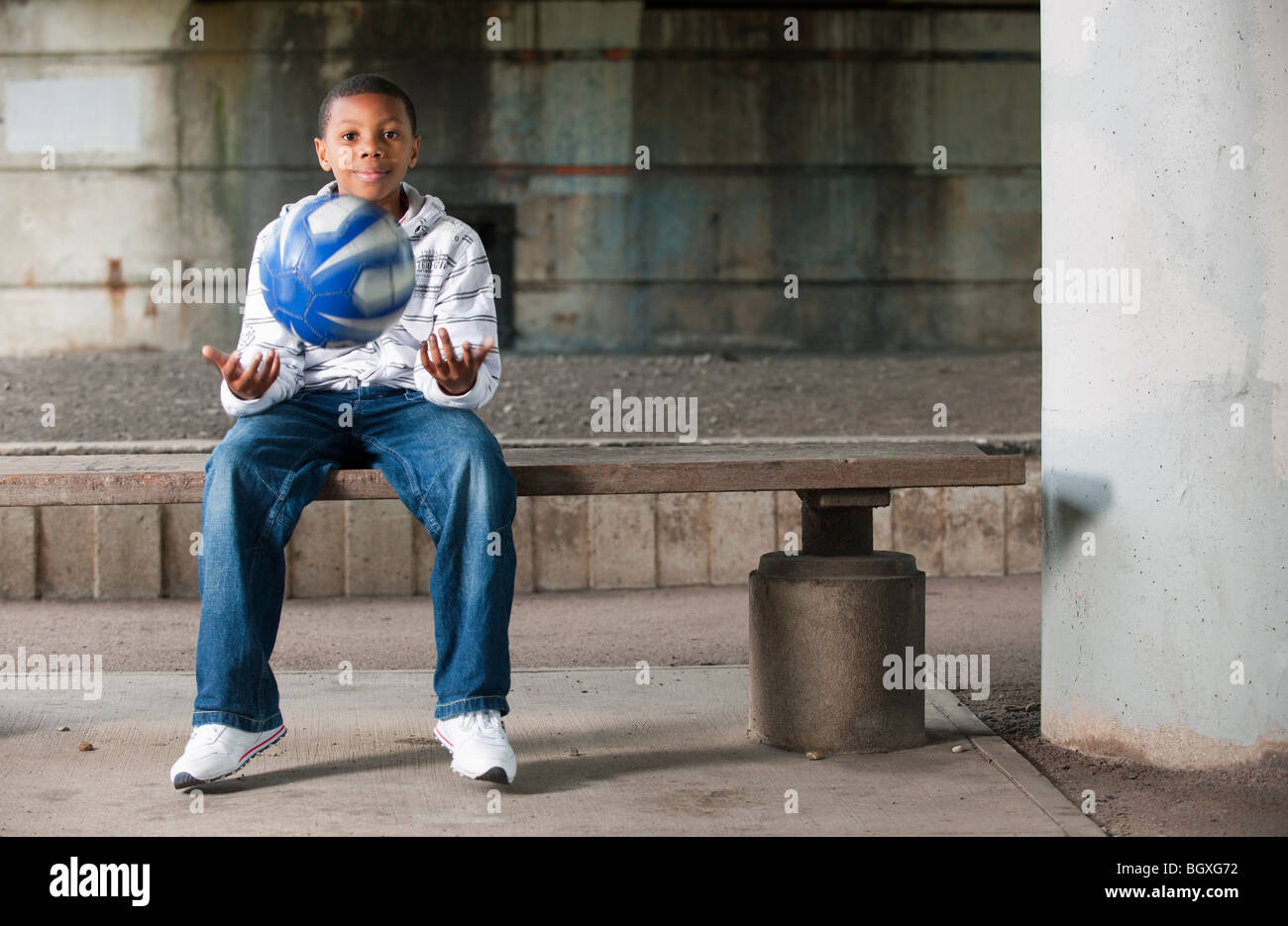African american boy catching ball hi-res stock photography and images ...