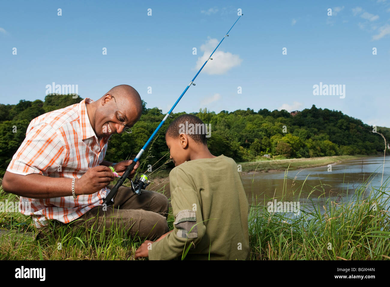 Child Holding Fishing Pole High Resolution Stock Photography and Images ...