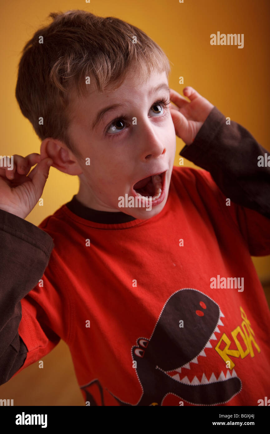 boy making face Stock Photo - Alamy