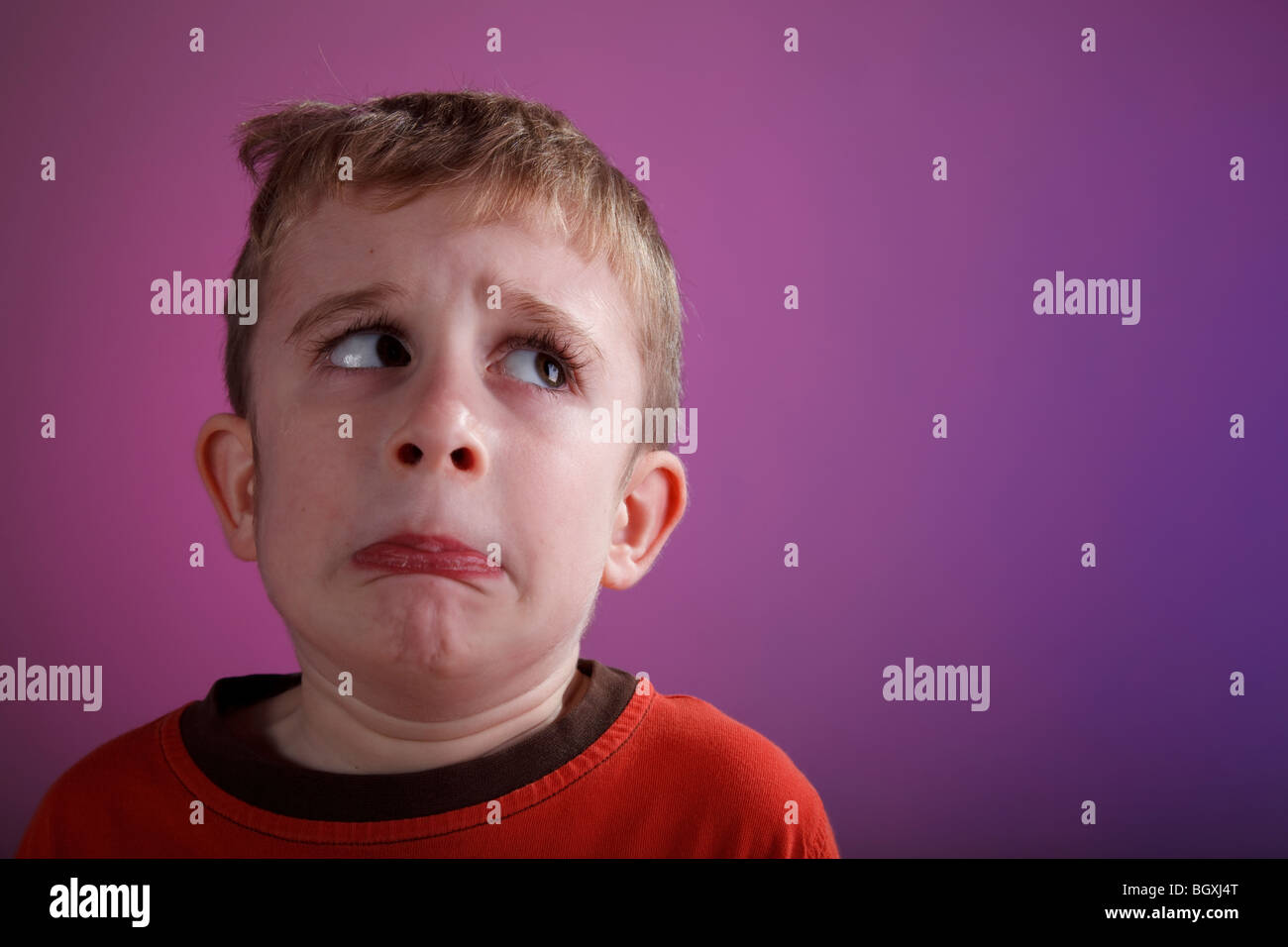 boy making face Stock Photo - Alamy