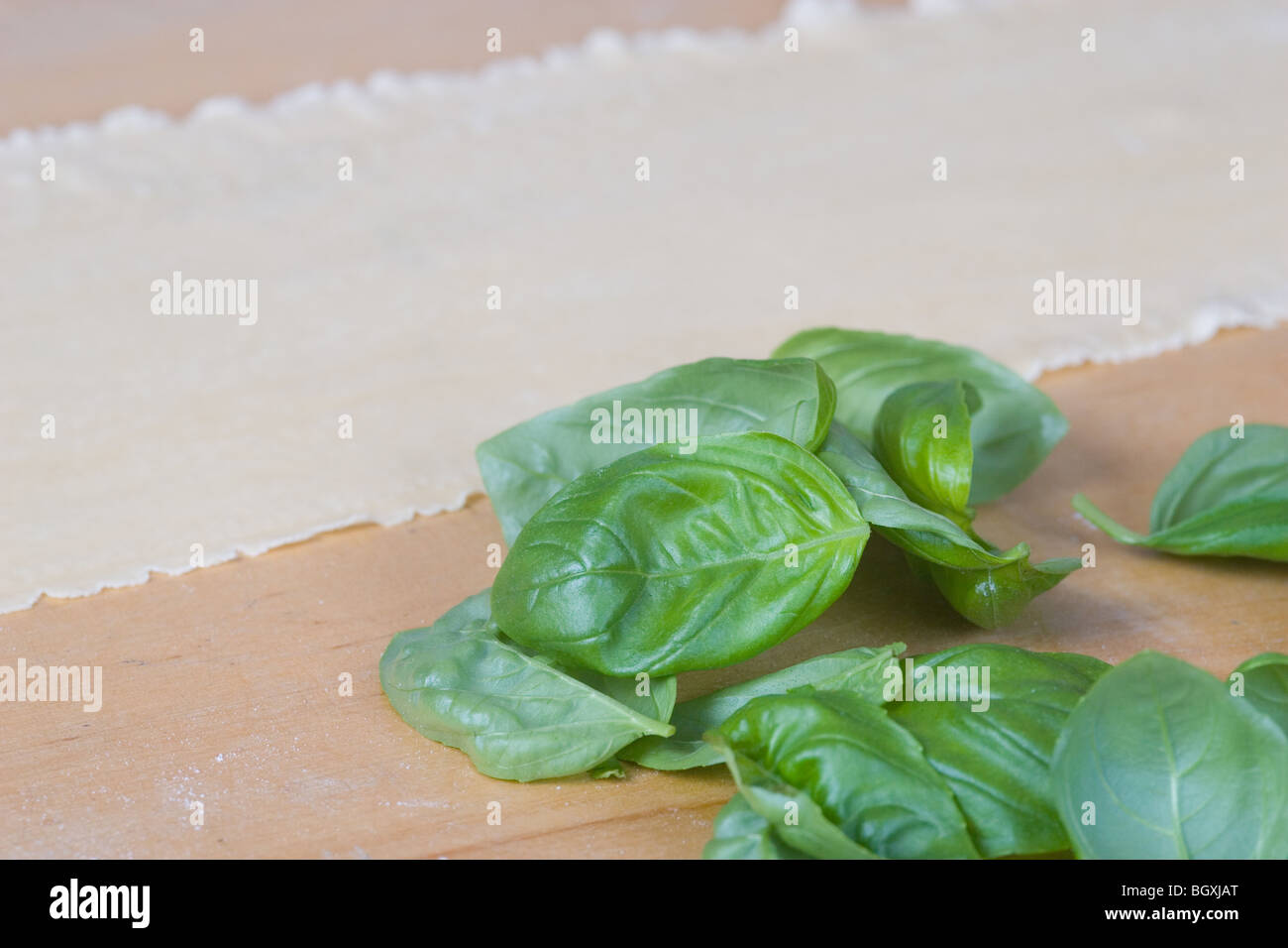 Pasta with basil Stock Photo - Alamy