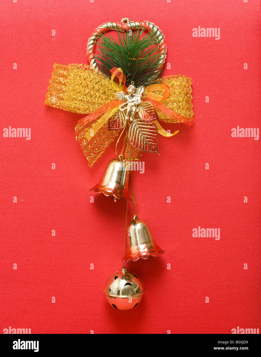 christmas bell decorations isolated on red backgrounds Stock Photo - Alamy