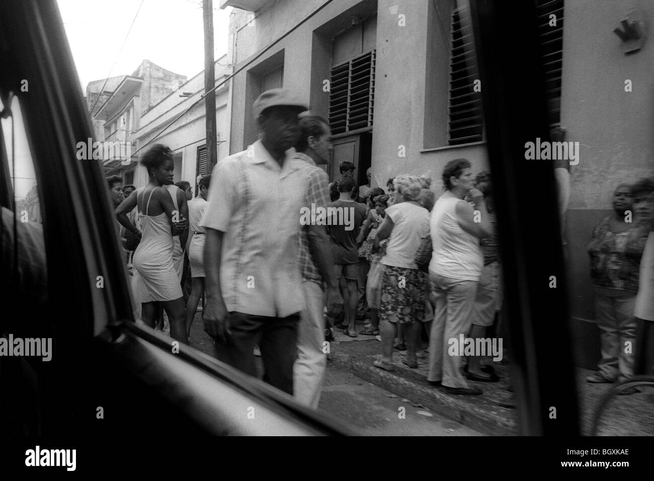 Queue scene Black and White Stock Photos & Images - Alamy
