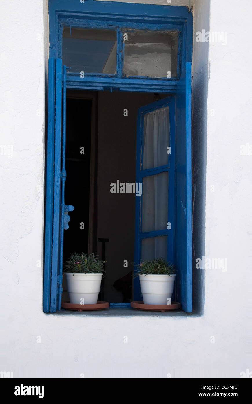 Open traditional greek blue window hi-res stock photography and images ...