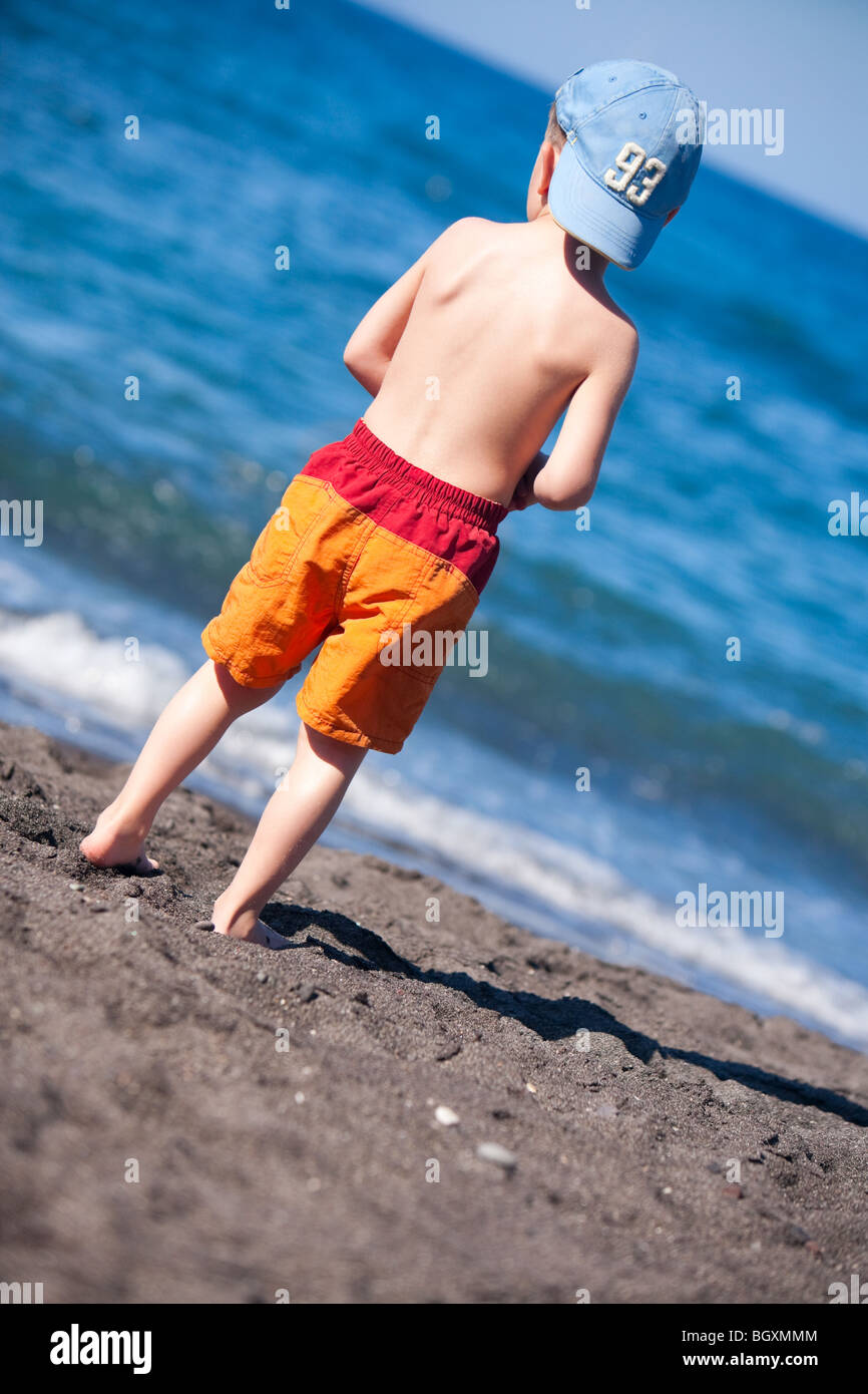 Boy at the beach Stock Photo - Alamy