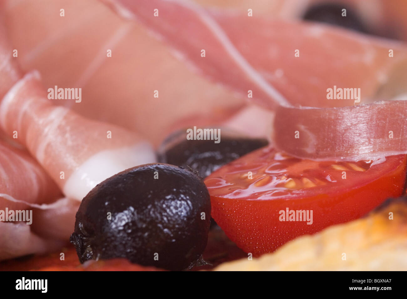 Olive with tomato Stock Photo - Alamy
