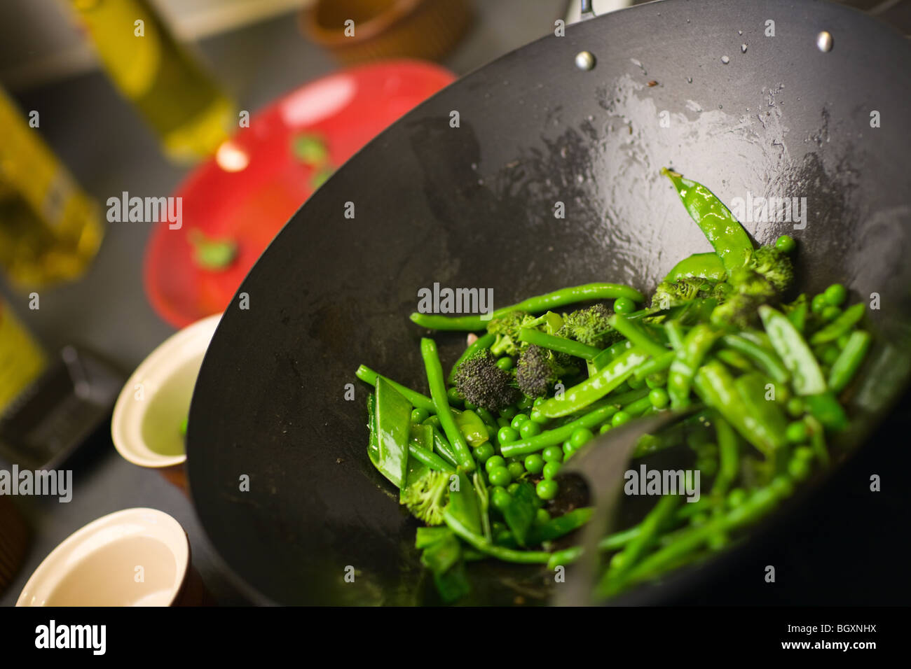 Chef cooking wok Stock Photo - Alamy
