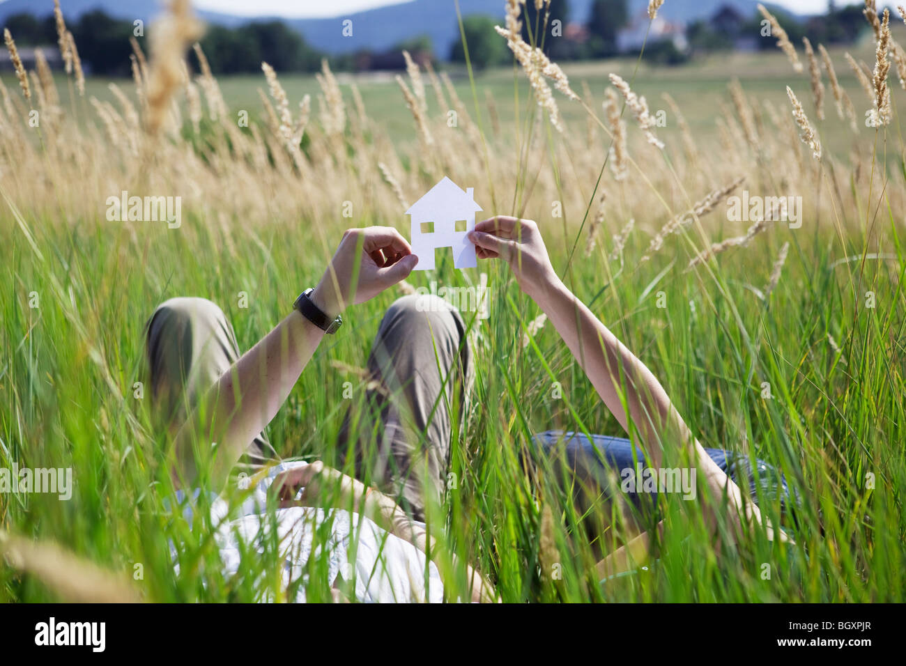 Young couple sharing paper hi-res stock photography and images - Alamy