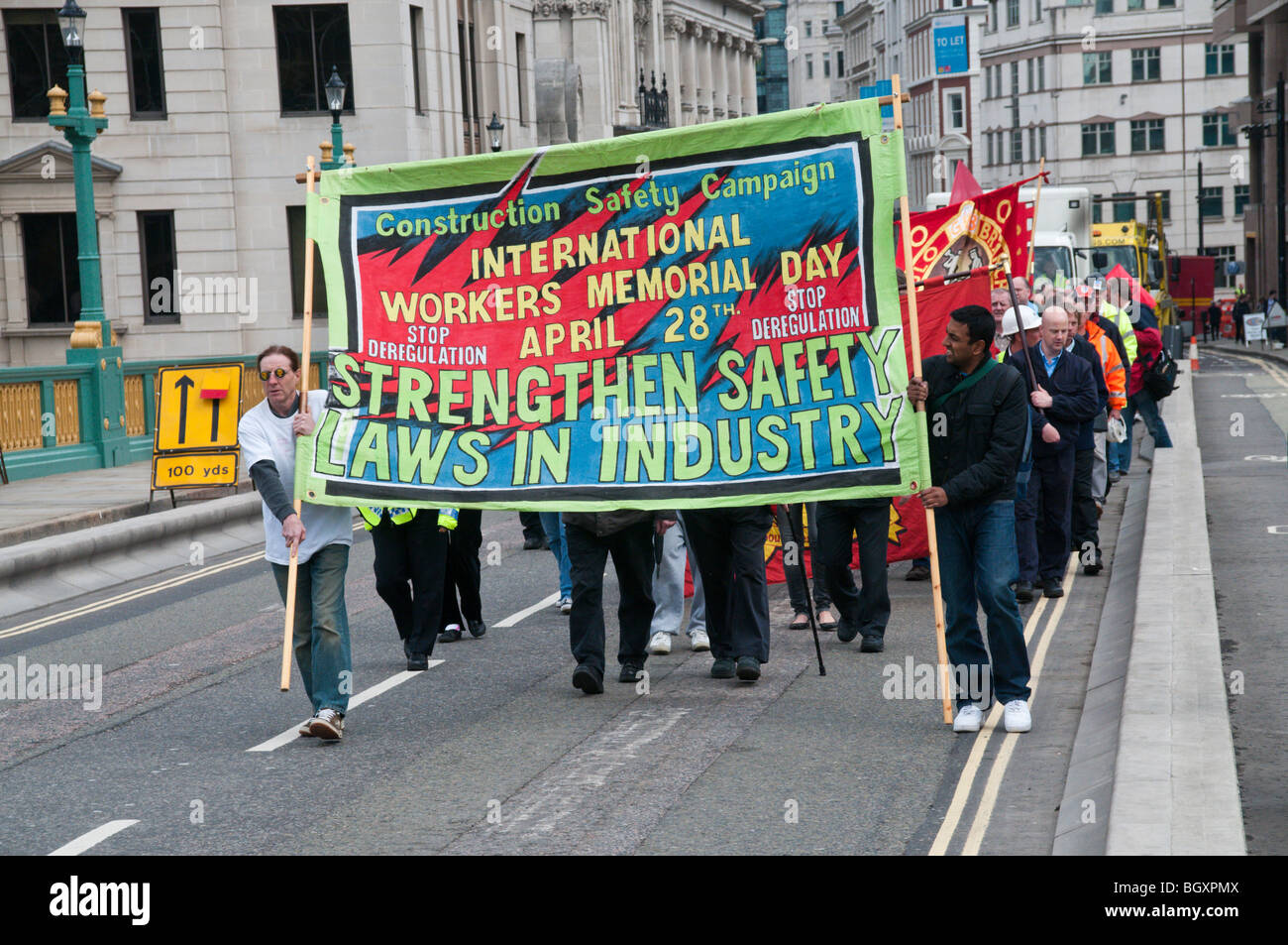 International Workers Memorial Day. The march behind the Construction ...