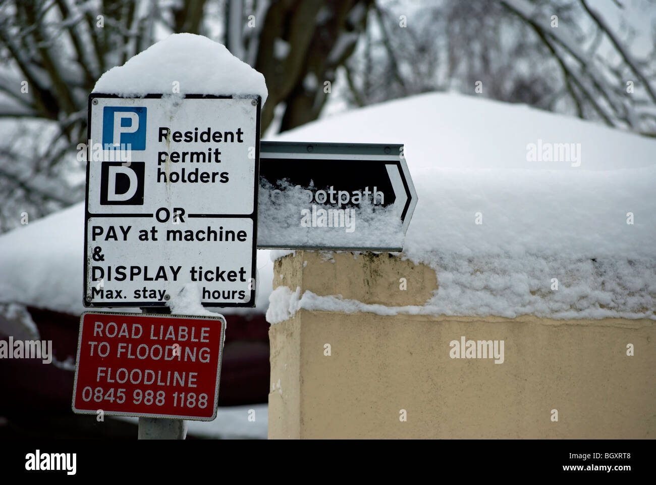snow on road signs, in twickenham middlesex, england, following heavy ...
