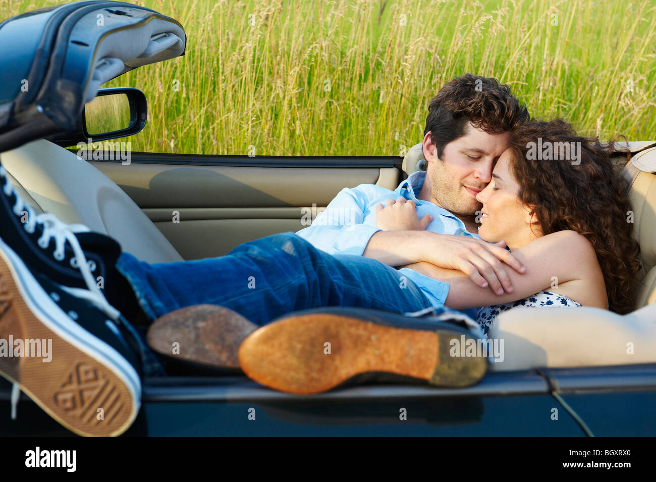 Woman laying down car hi-res stock photography and images - Alamy
