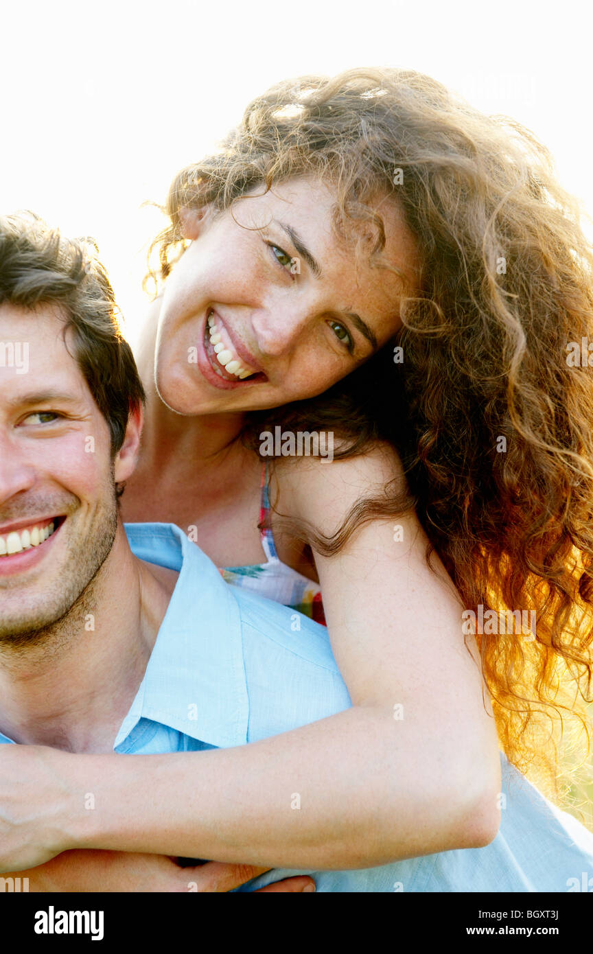 Man carrying woman Stock Photo - Alamy