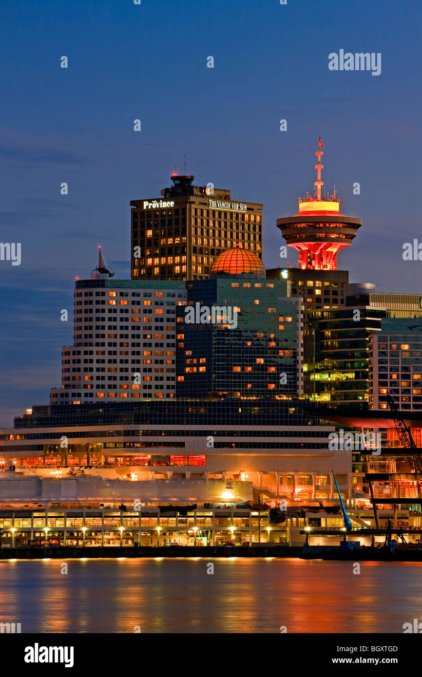 Waterfront and high rise buildings in the city of Vancouver at dusk ...