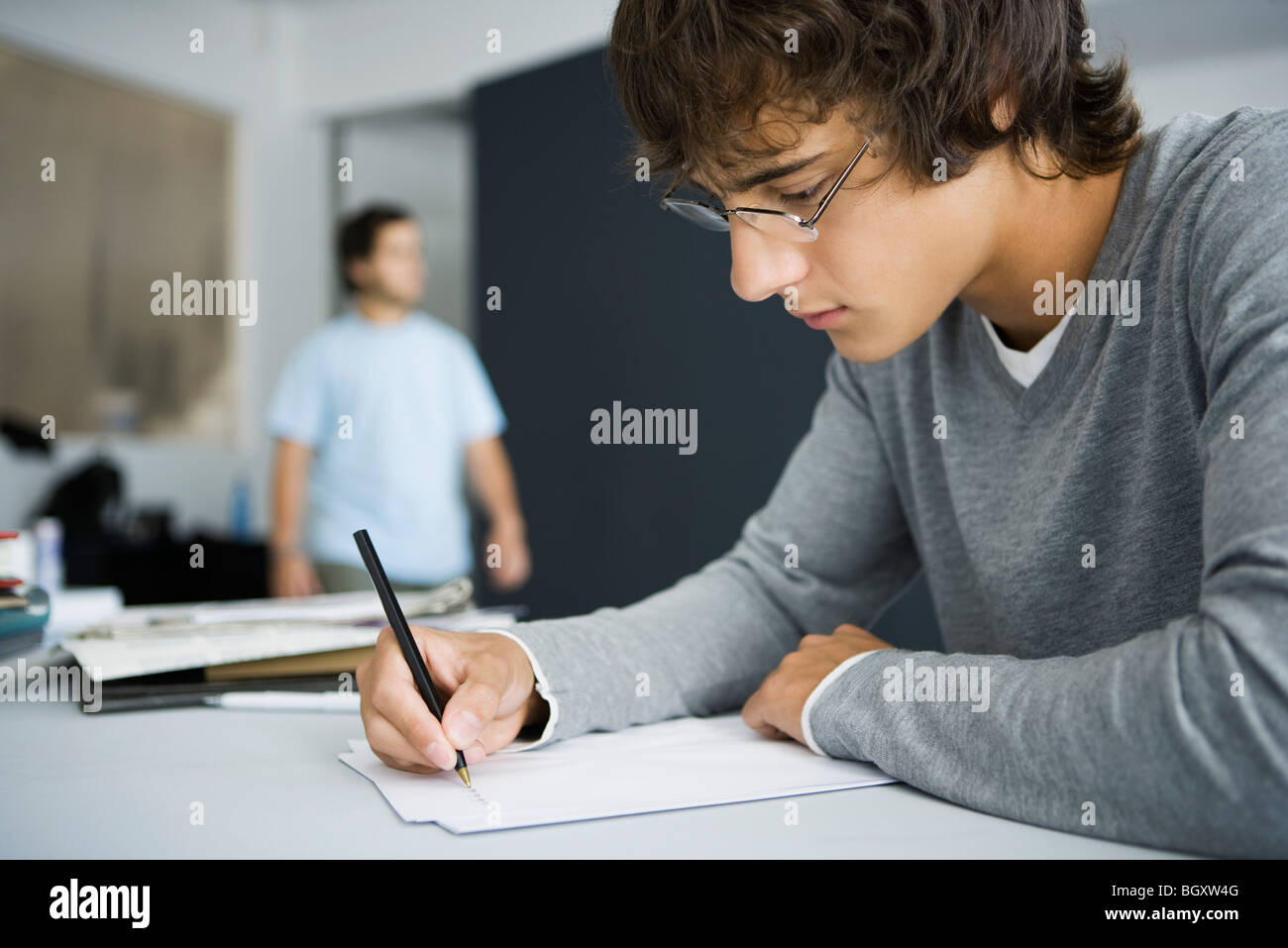 Young adult desk notes pens hi-res stock photography and images - Alamy