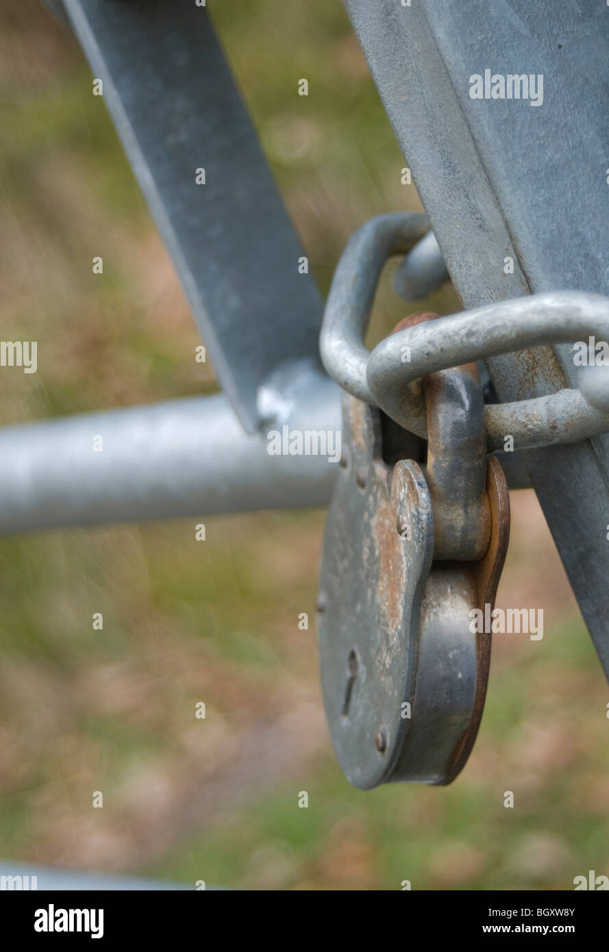 close up of a padlock on a metal farm gate Stock Photo - Alamy