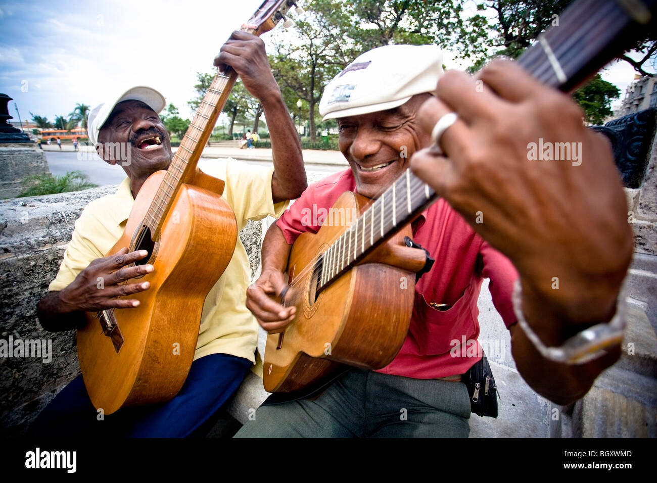 Guitars instruments smiling laughing hi-res stock photography and ...