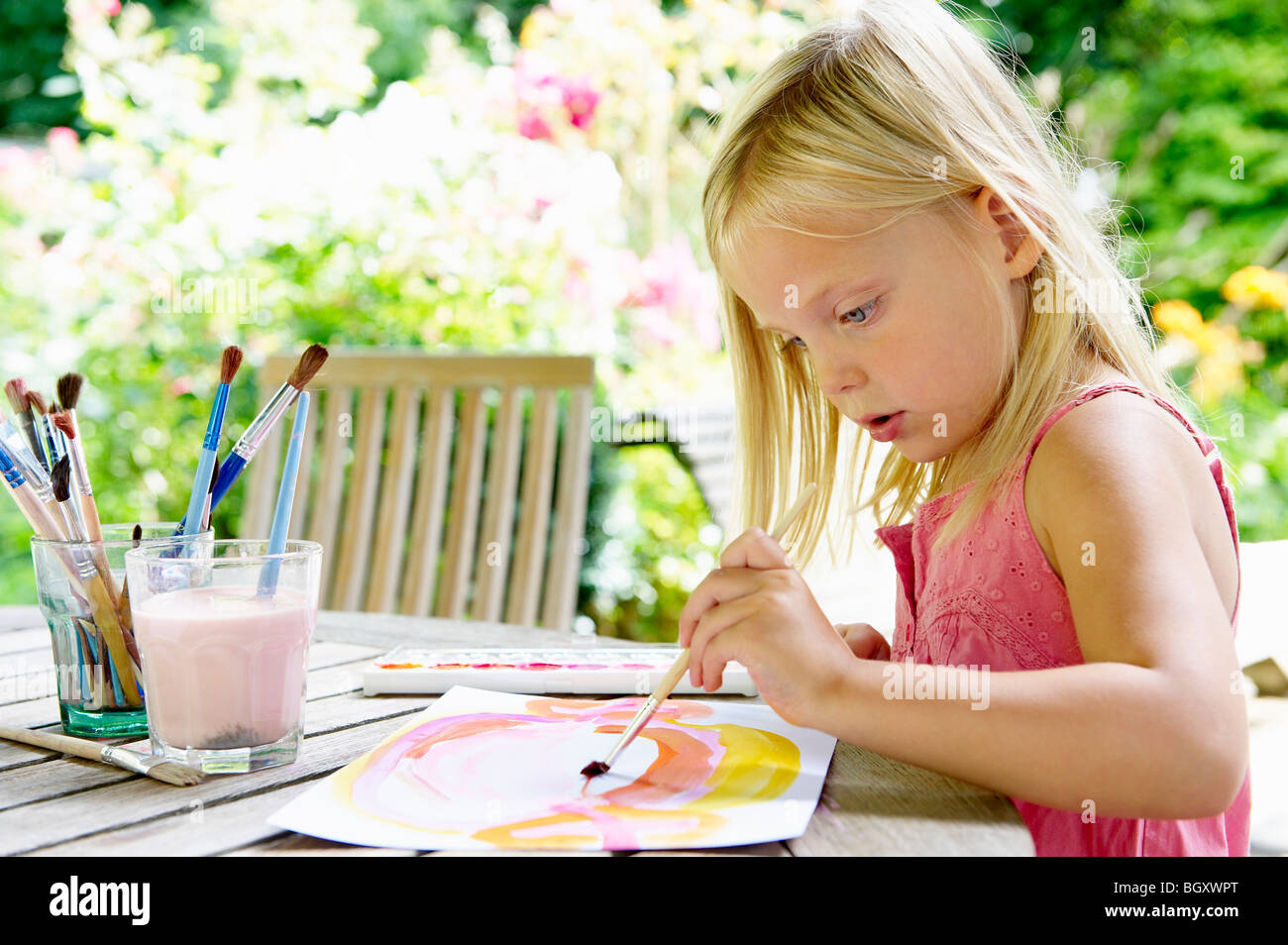Girl painting, outdoors Stock Photo - Alamy