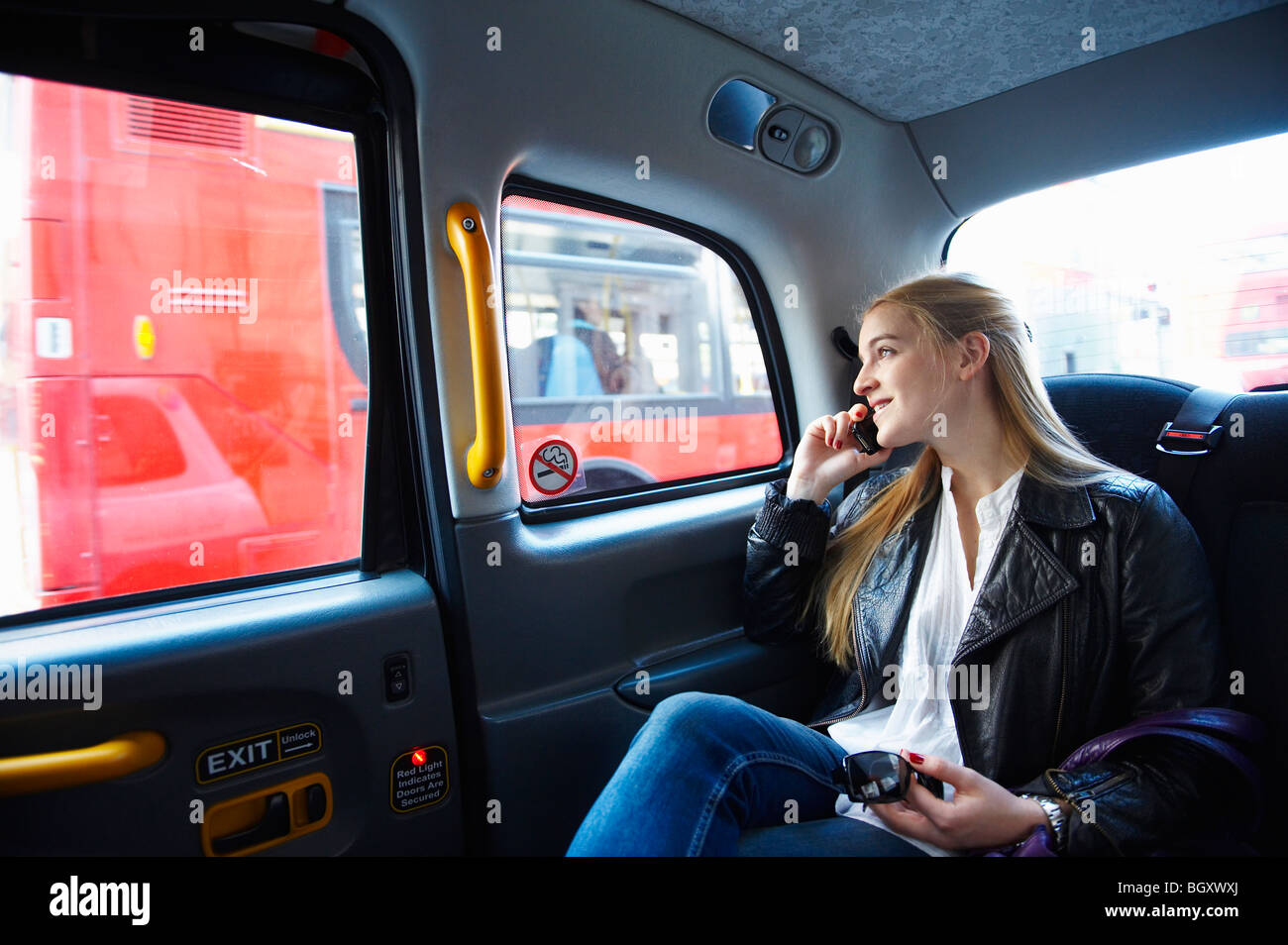 Back view woman phoning hi-res stock photography and images - Alamy