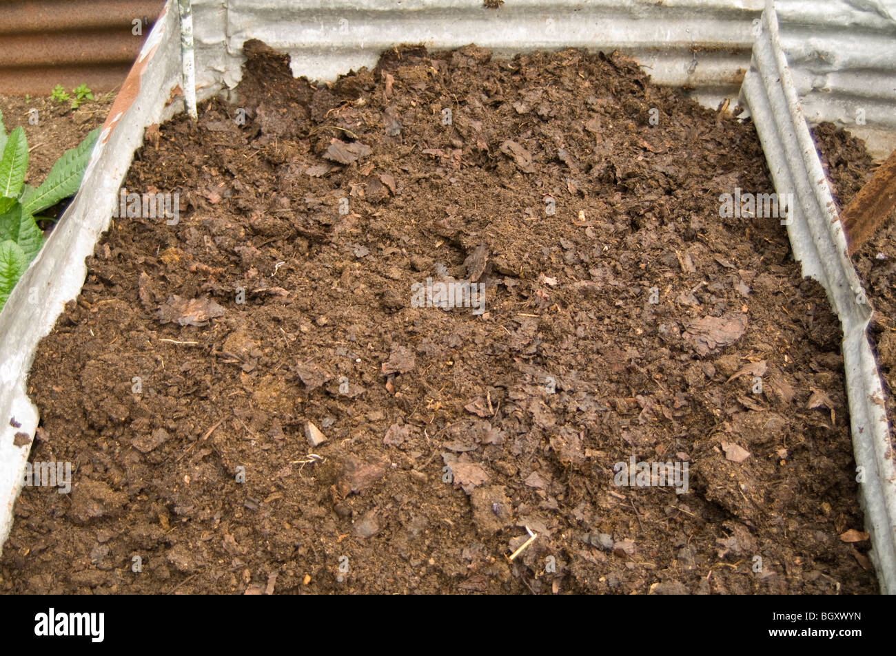 Compost heap on an allotment plot Stock Photo - Alamy