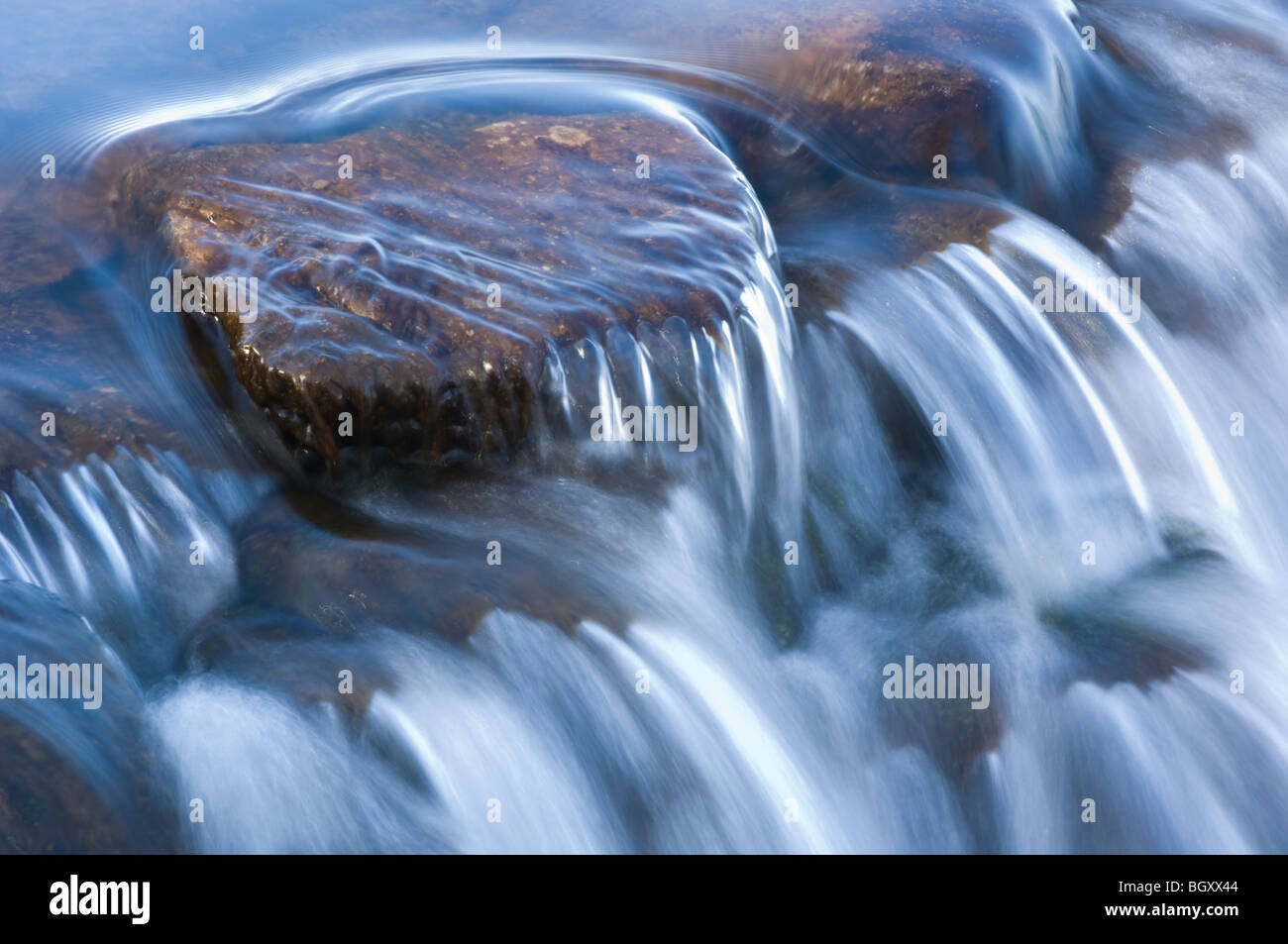 Silky clear water cascades over rocks-Giant Springs State Park, Montana ...