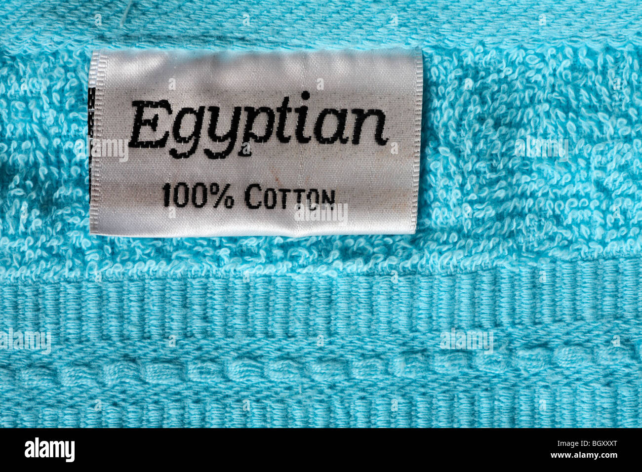 Egyptian 100% cotton label in turquoise blue flannel Stock Photo - Alamy