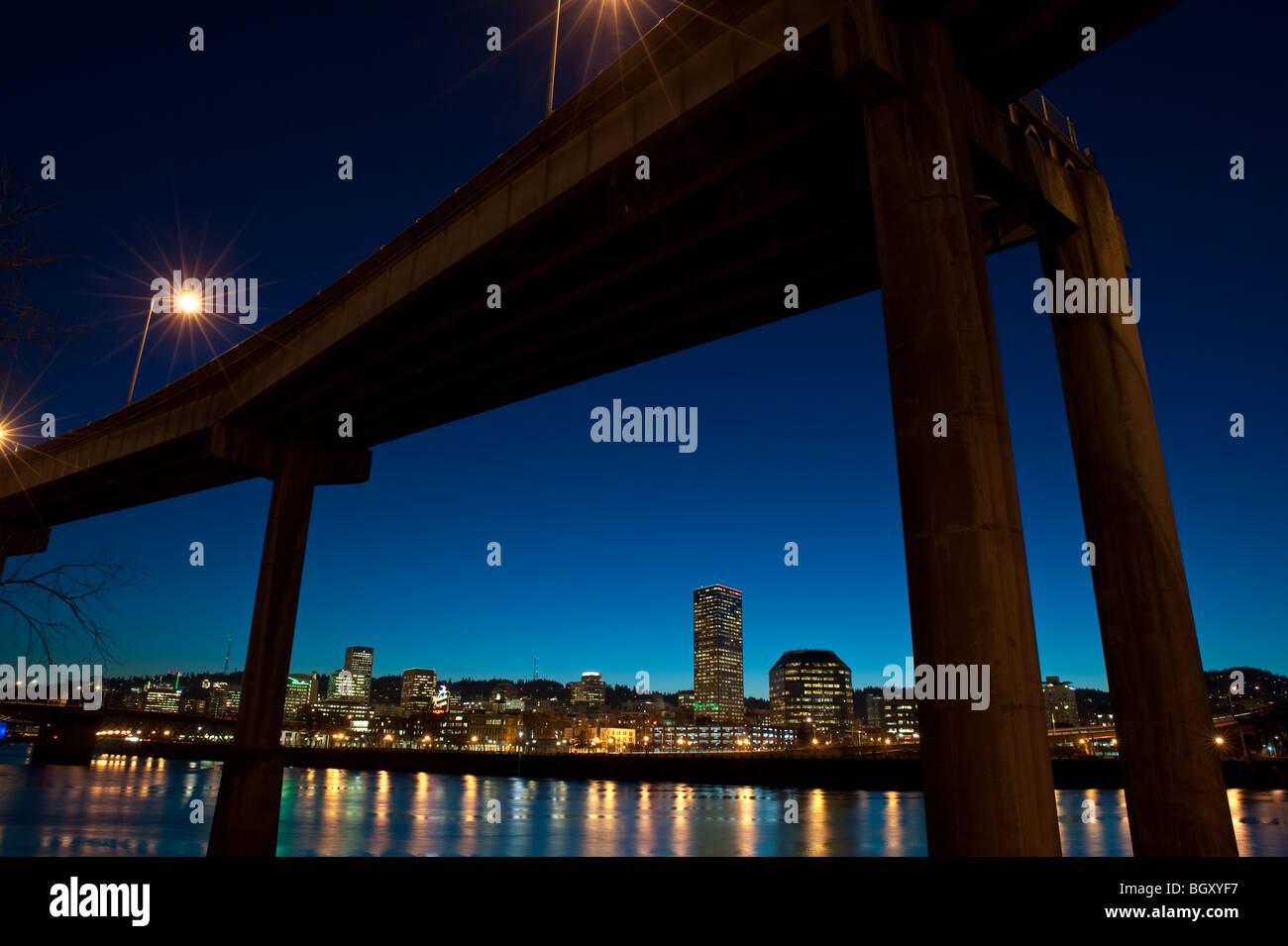 Portland, Oregon, at twilight, with highway overpass above Stock Photo ...