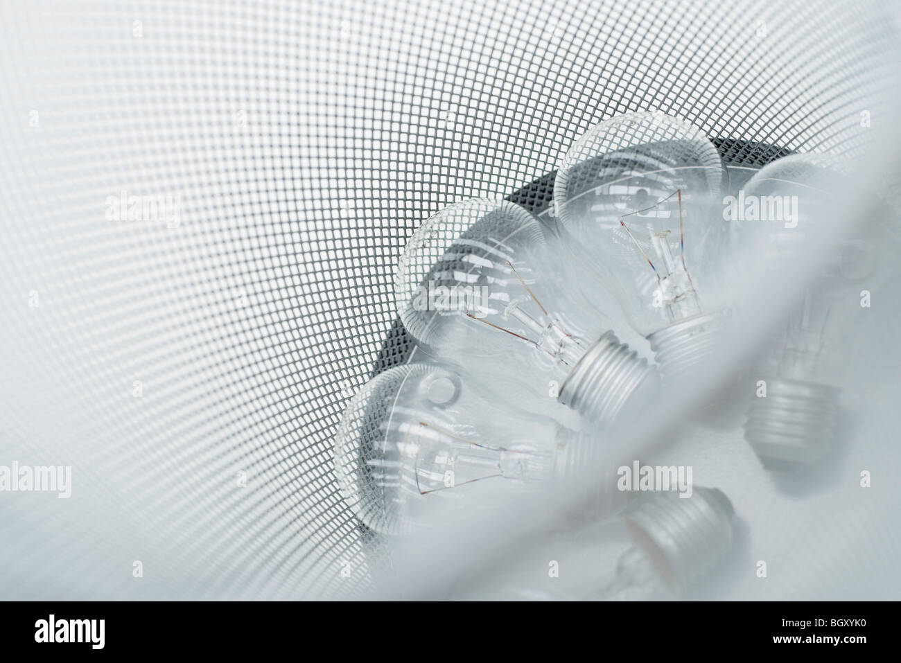 Conventional light bulbs in garbage can Stock Photo - Alamy