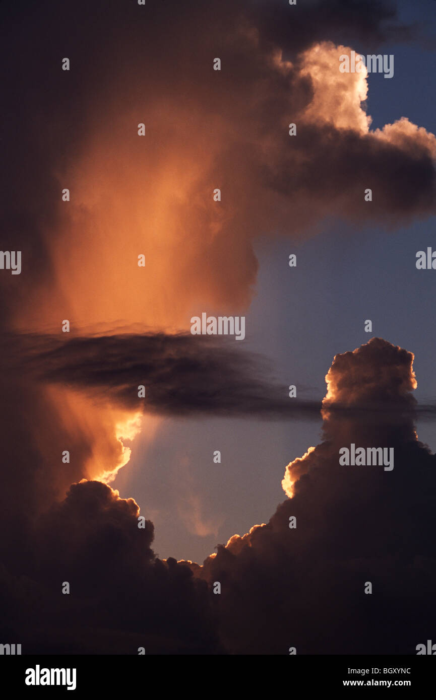 Sunbeams through clouds Stock Photo - Alamy