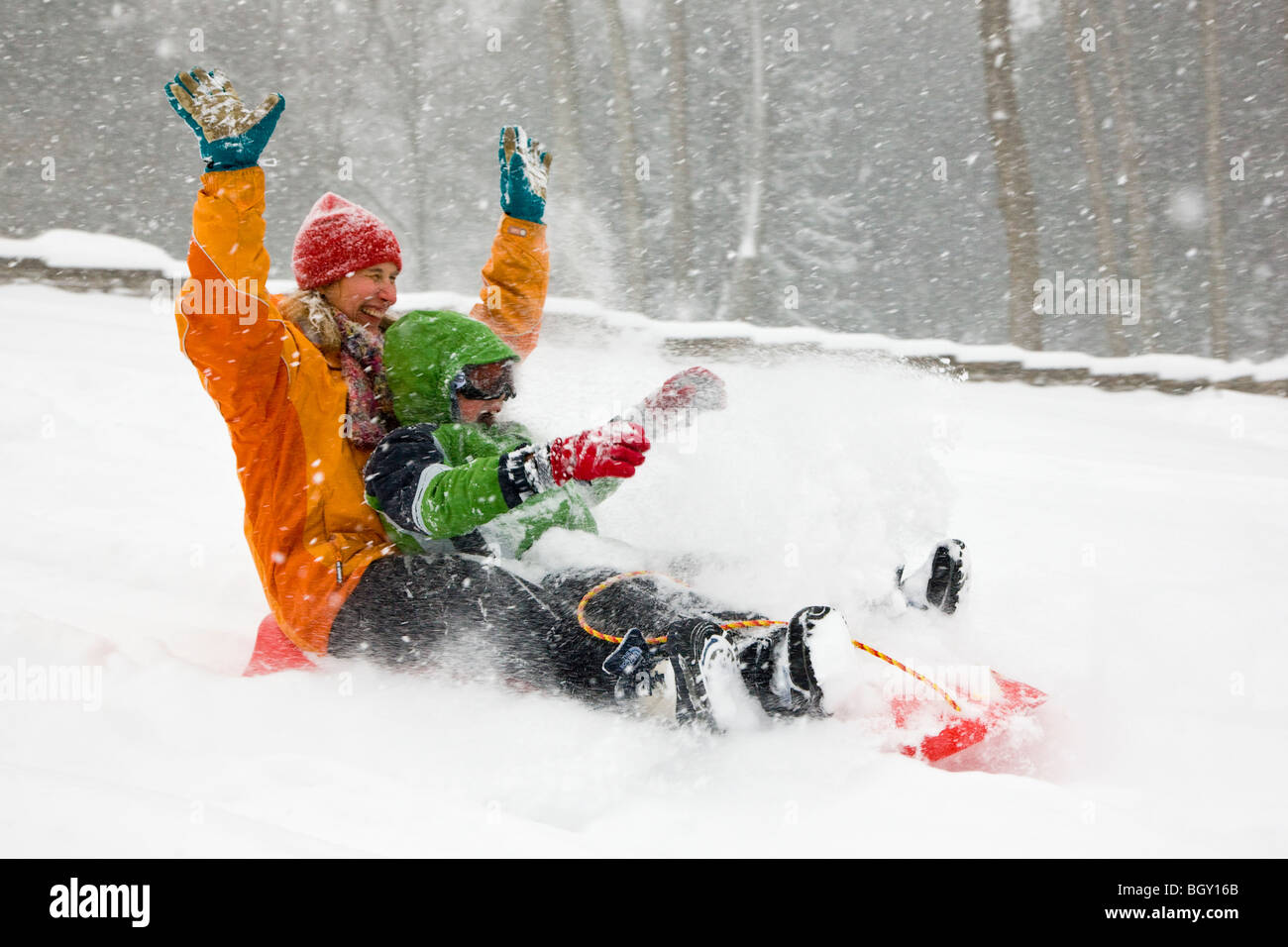 Weather snow storm sledding activity hi-res stock photography and ...