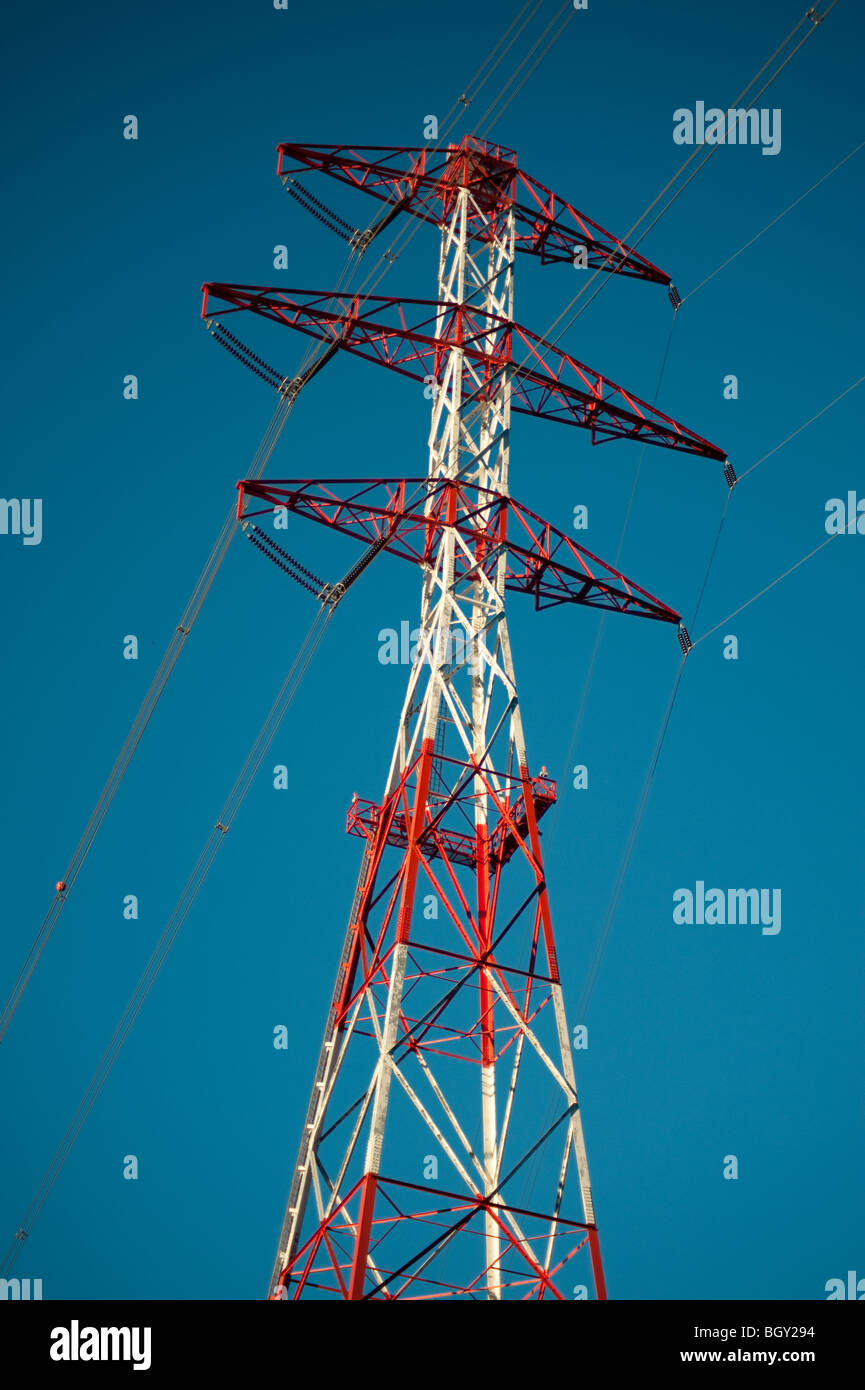 Energy transmission towers against a blue sky Stock Photo - Alamy