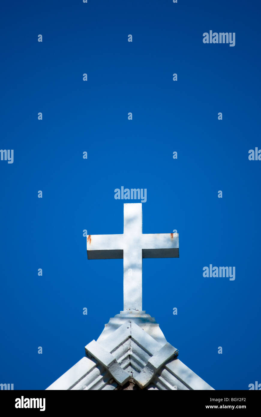 Stone white cross in front of blue sky hi-res stock photography and ...